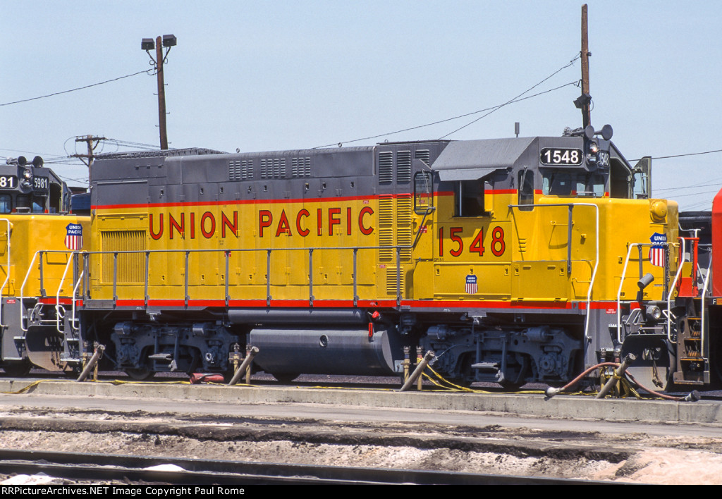UP 1548, EMD GP15-1, ex CNW 4403, fresh repaint at Proviso Yard